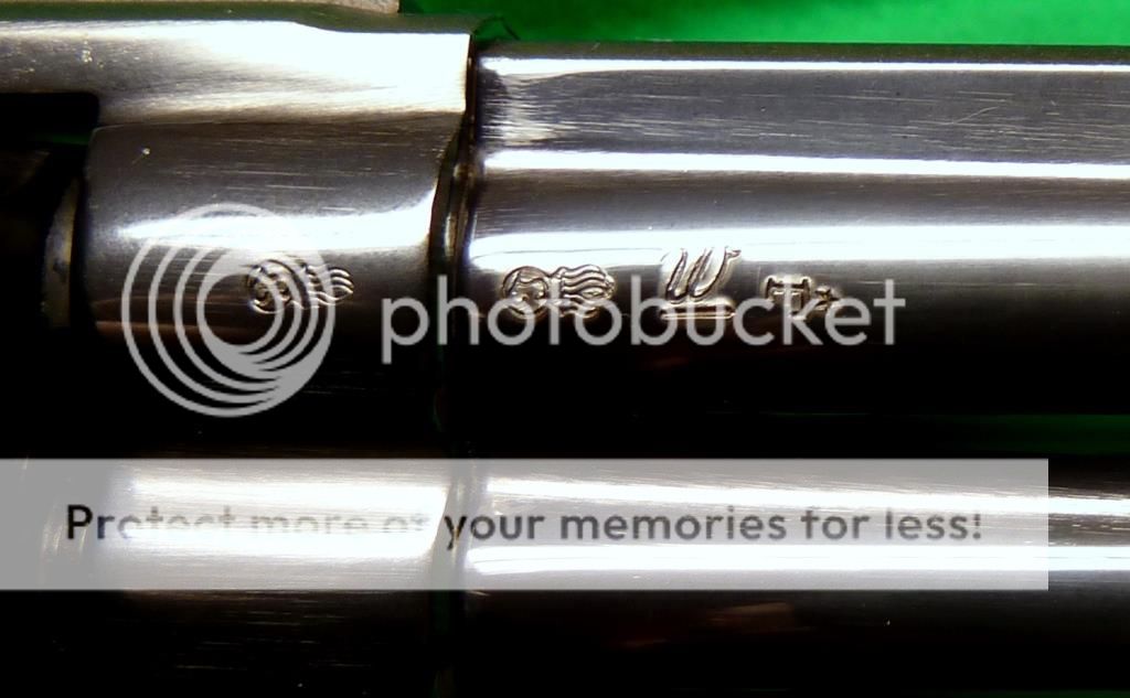 Scored Nice586 8 3/8ths - Belgian Proof Marks